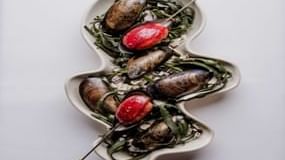 Close-up of oysters with Black Pudding served at Tom Brown at the Capital