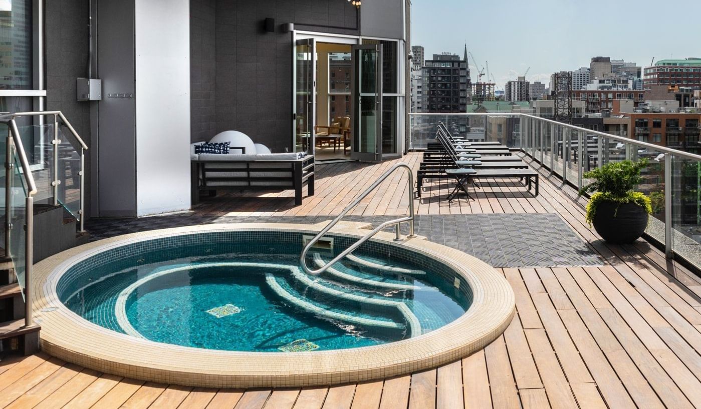 Terrace pool with sun loungers at Warwick Le Crystal