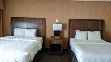 Jr Suite w Queen Beds& Walkout Patio - Evergreen Resort