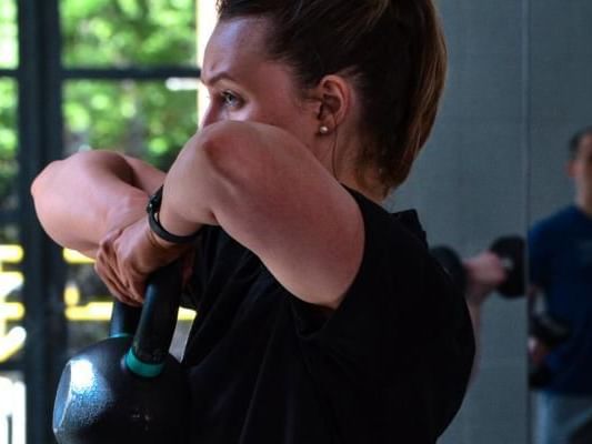 In short, AMRAP stands for "As Many Reps As Possible."