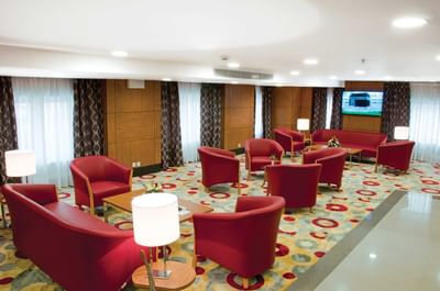 Comfy lounge area in Mina Café at Elaf Bakkah Hotel