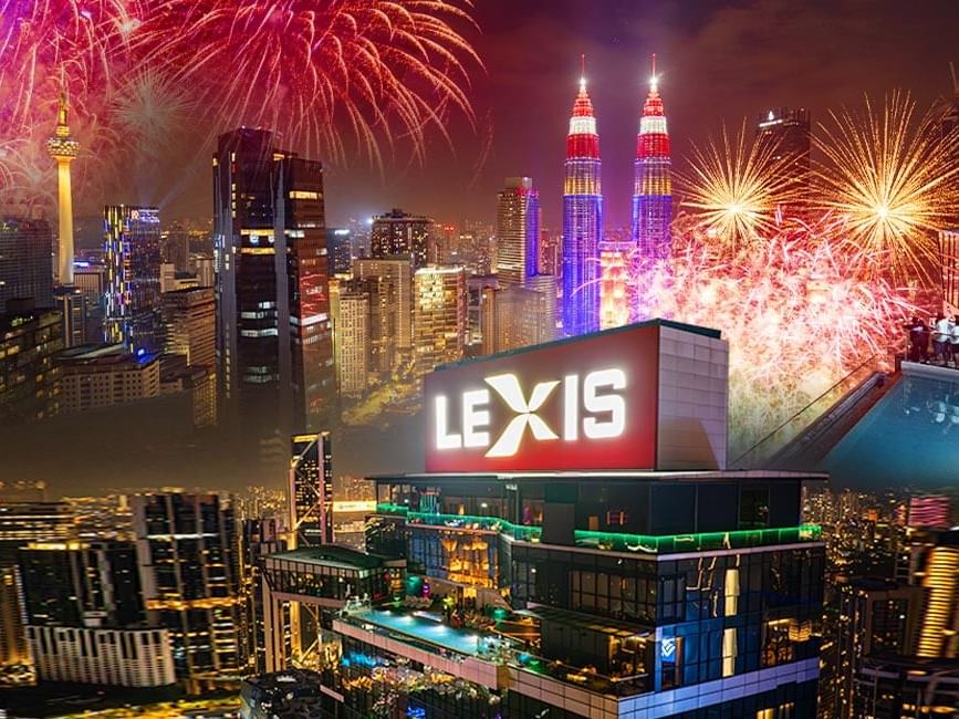 Skyline View from Imperial Lexis Aglow in a Starburst of Fireworks ...