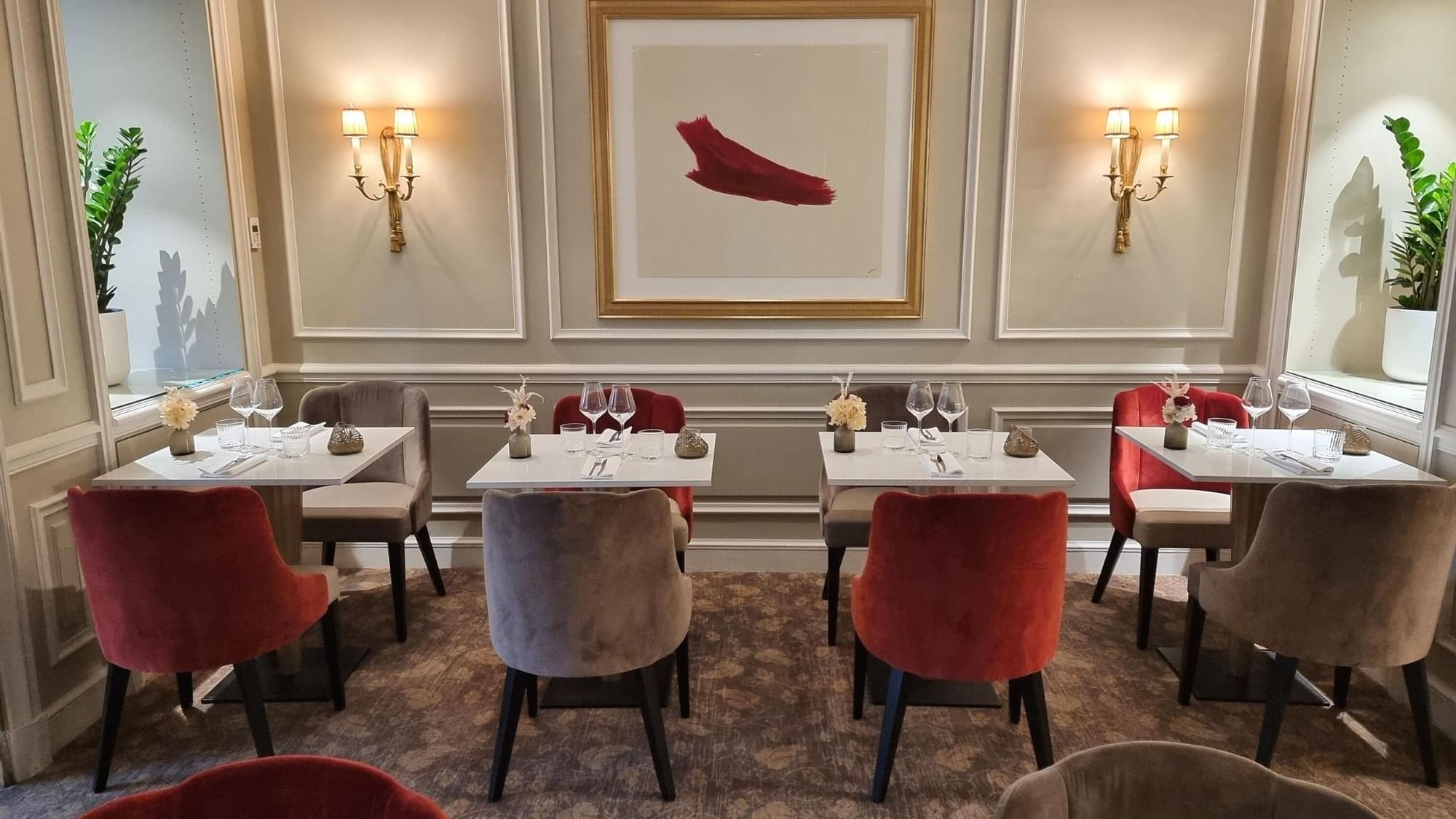 Le Celadon Restaurant with decor and carpeted floors at Hôtel Westminster - Paris